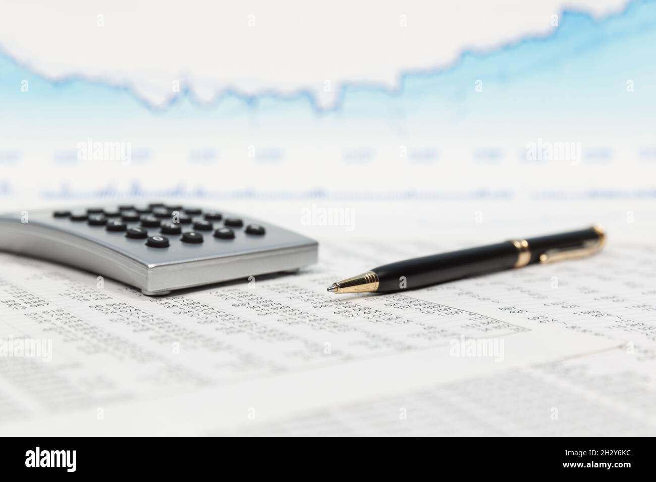 Financial accounting stock market graphs and charts analysis pen and ...