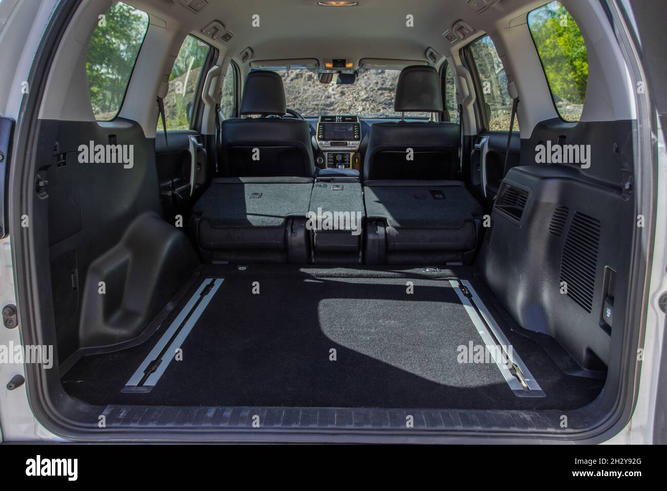 Huge, clean and empty car trunk in interior of compact suv. Rear view ...