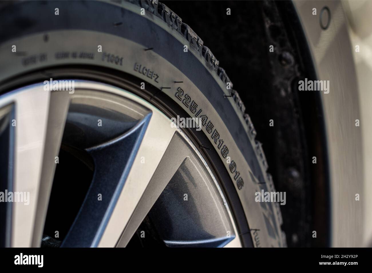 Close up view of tire with tire width, height and wheel diameter ...