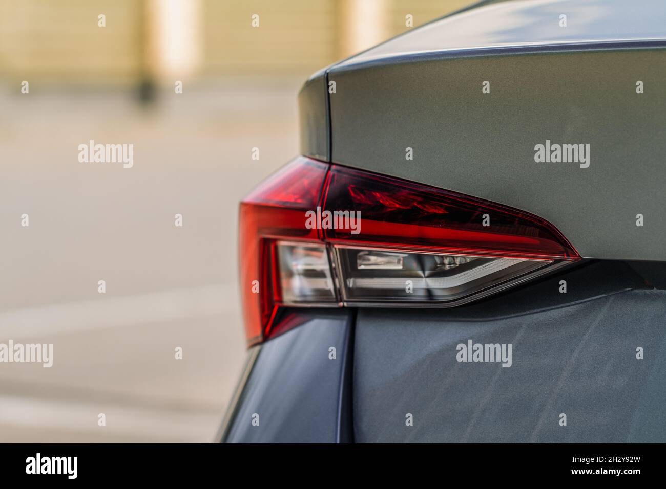 Modern rear light of a car. Brake light and arrow of large suv. Rear ...