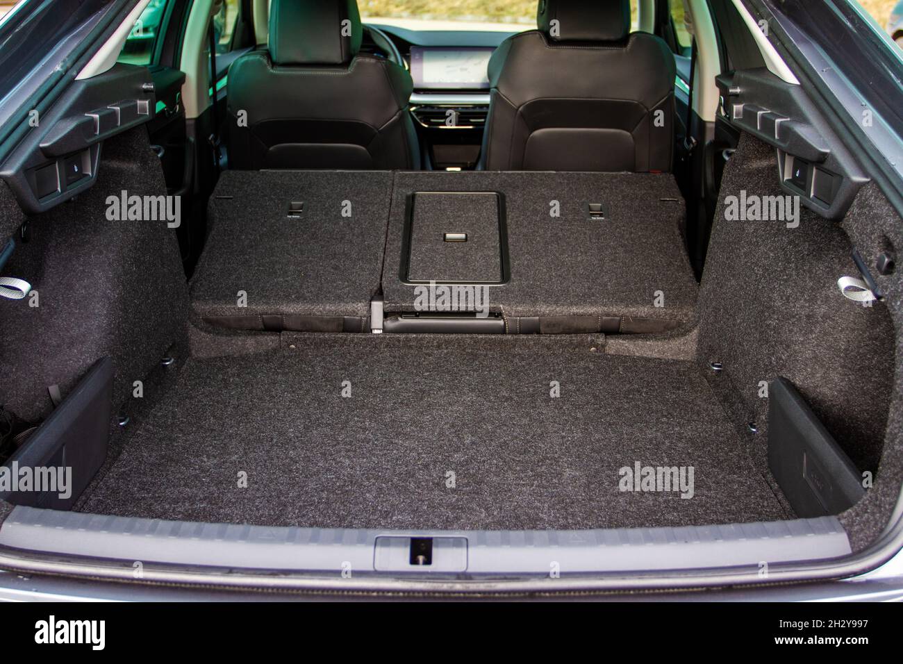 Modern sedan car open trunk. Huge, clean and empty car trunk in ...