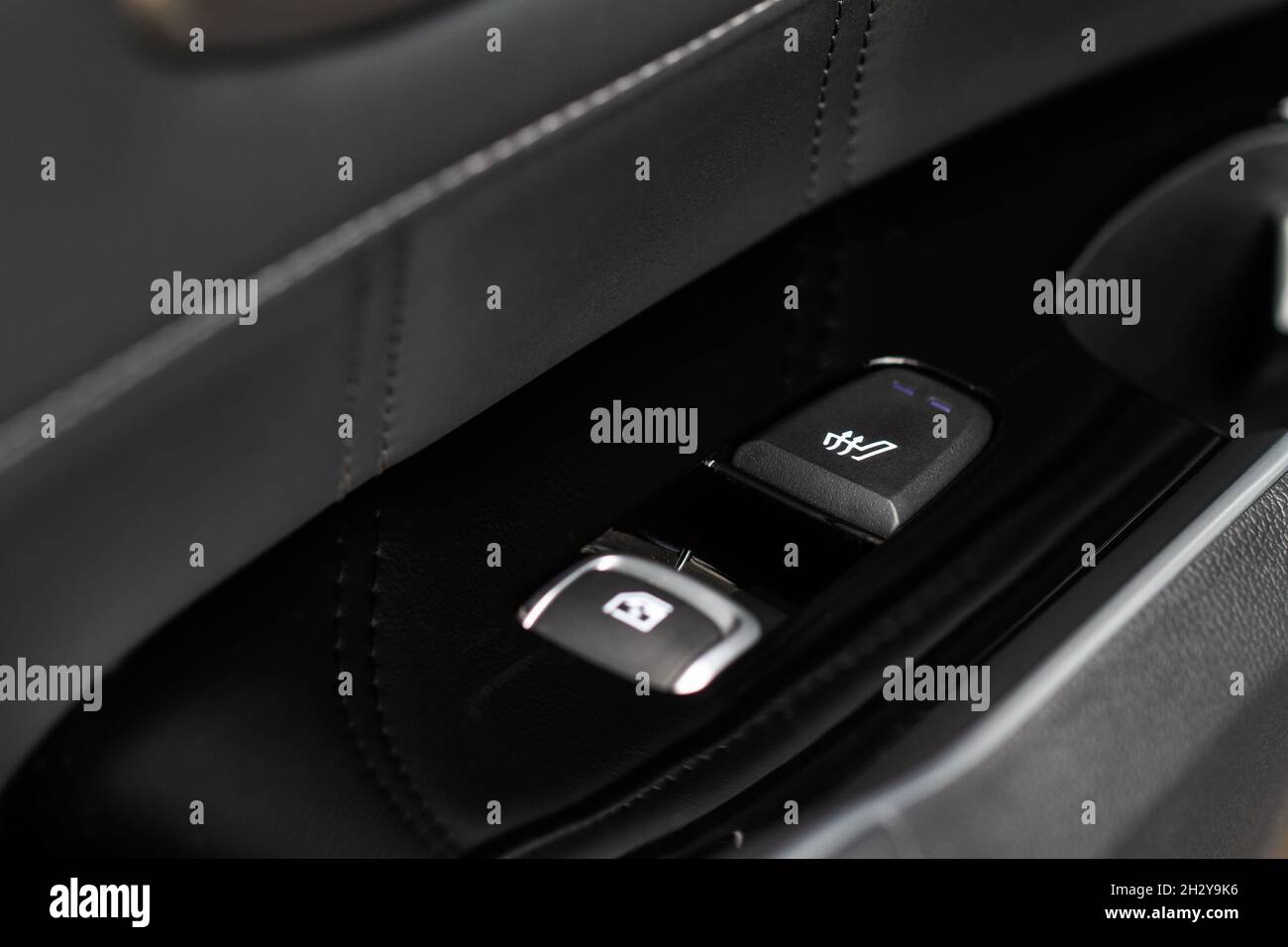 Seat heating controller buttons close up view. Car interior. Seat ...