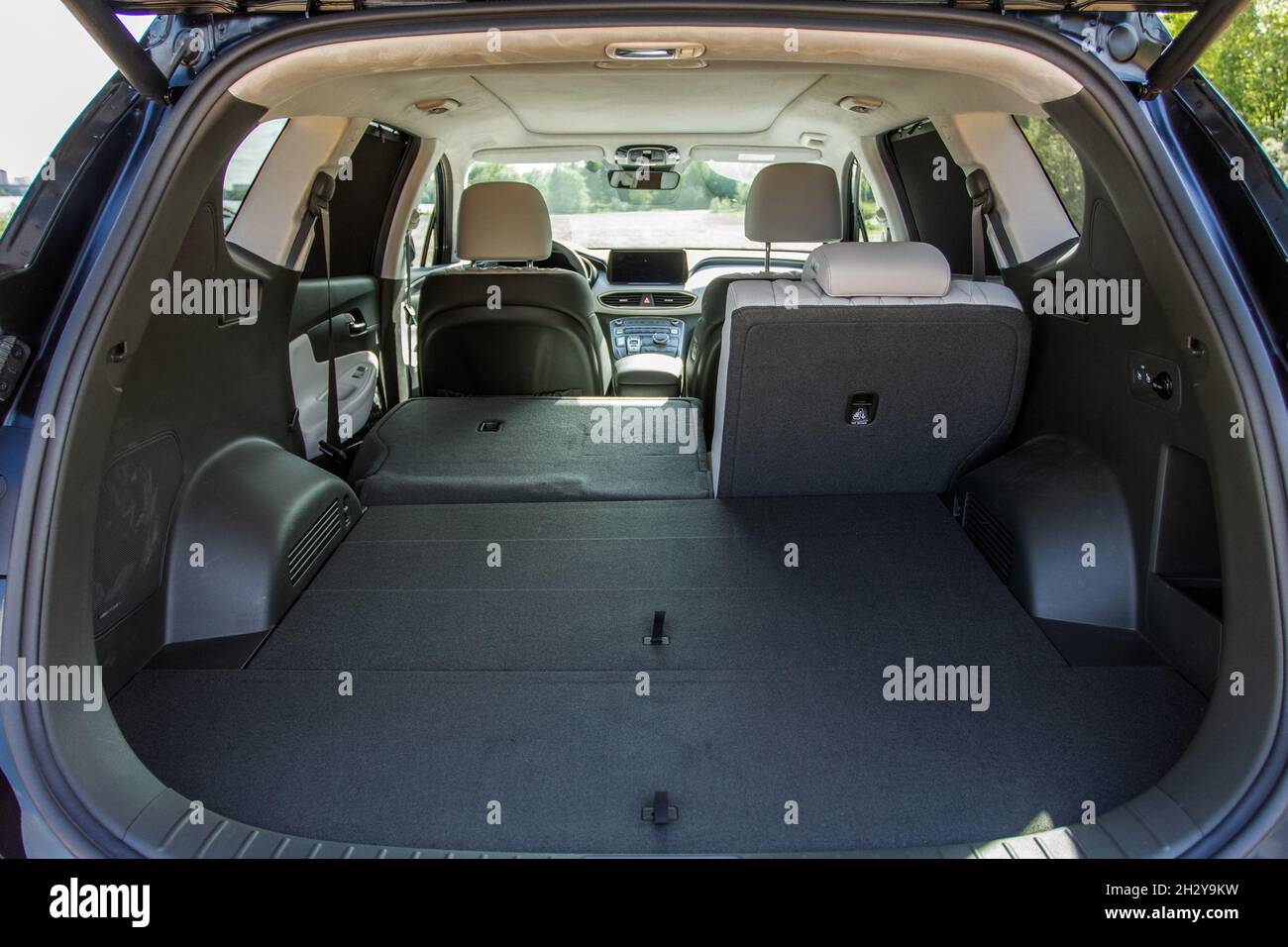 Huge, clean and empty car trunk in interior of compact suv. Rear view ...