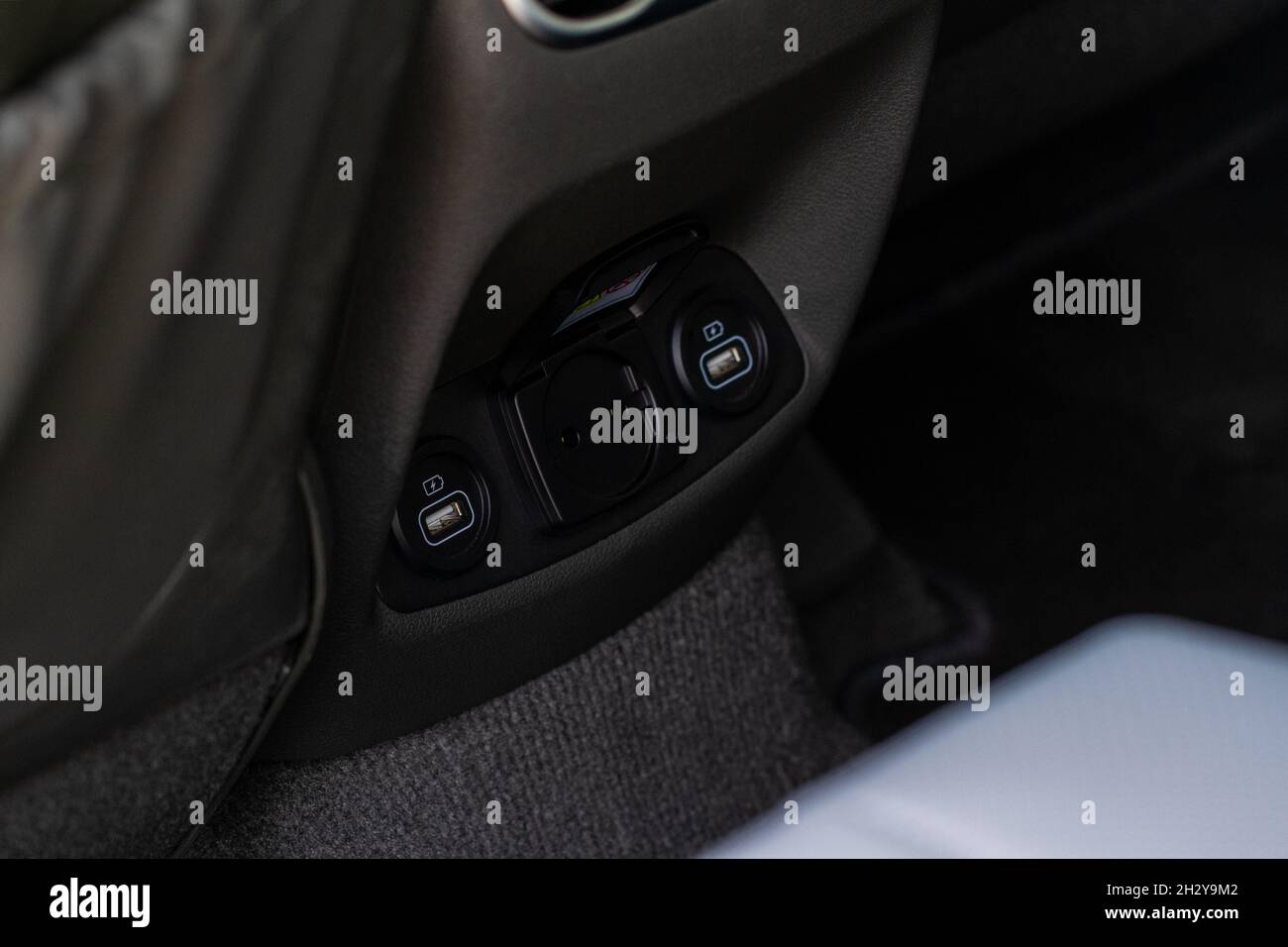 12V and 220v power outlet socket in the car. Opened sockets Stock Photo ...