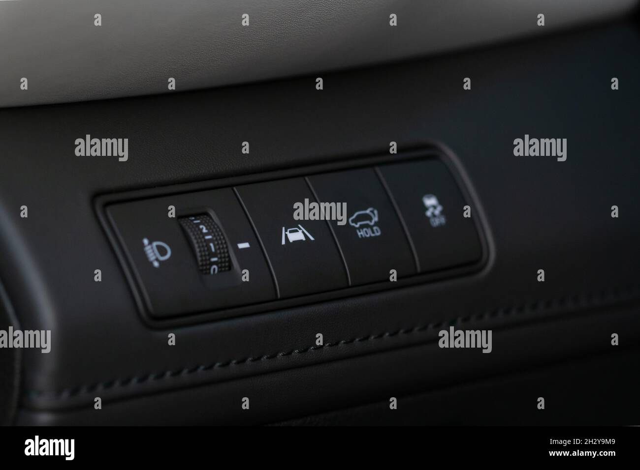 Track assistant in a modern car. LDWS switch button. Lane Departure ...