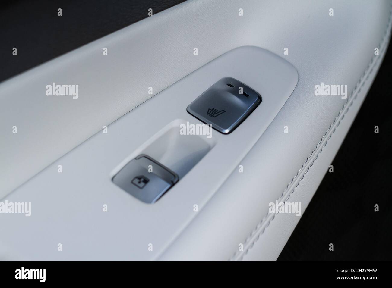 Seat heating controller buttons close up view. Car interior. Seat ...