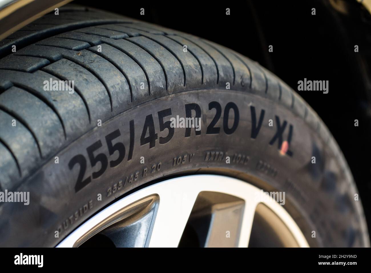 Close up view of tire with tire width, height and wheel diameter ...