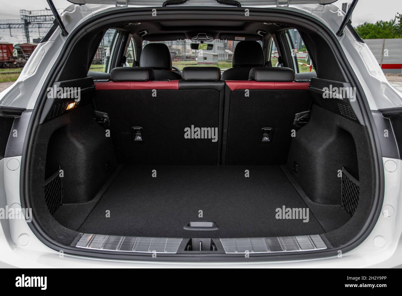 Huge, clean and empty car trunk in interior of compact suv. Rear view ...
