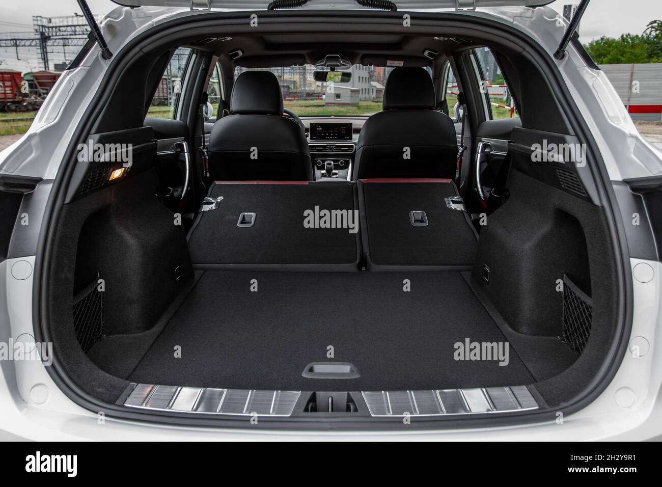 Huge, clean and empty car trunk in interior of compact suv. Rear view ...