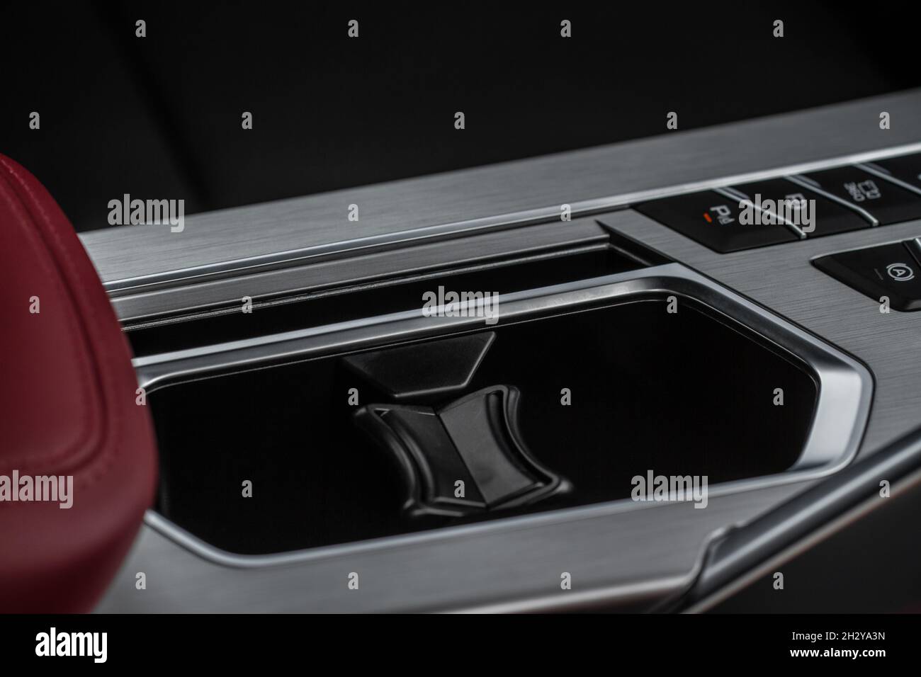 Cup holders inside modern car interior. Interior view of modern car ...