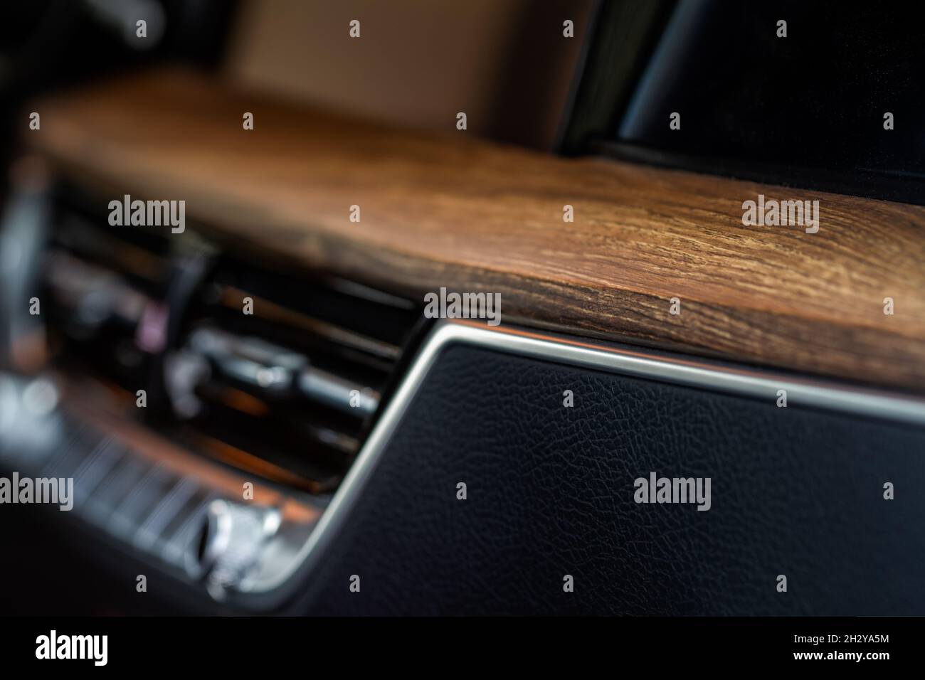 Modern car interior details. Car wooden panel. Interior of prestige ...