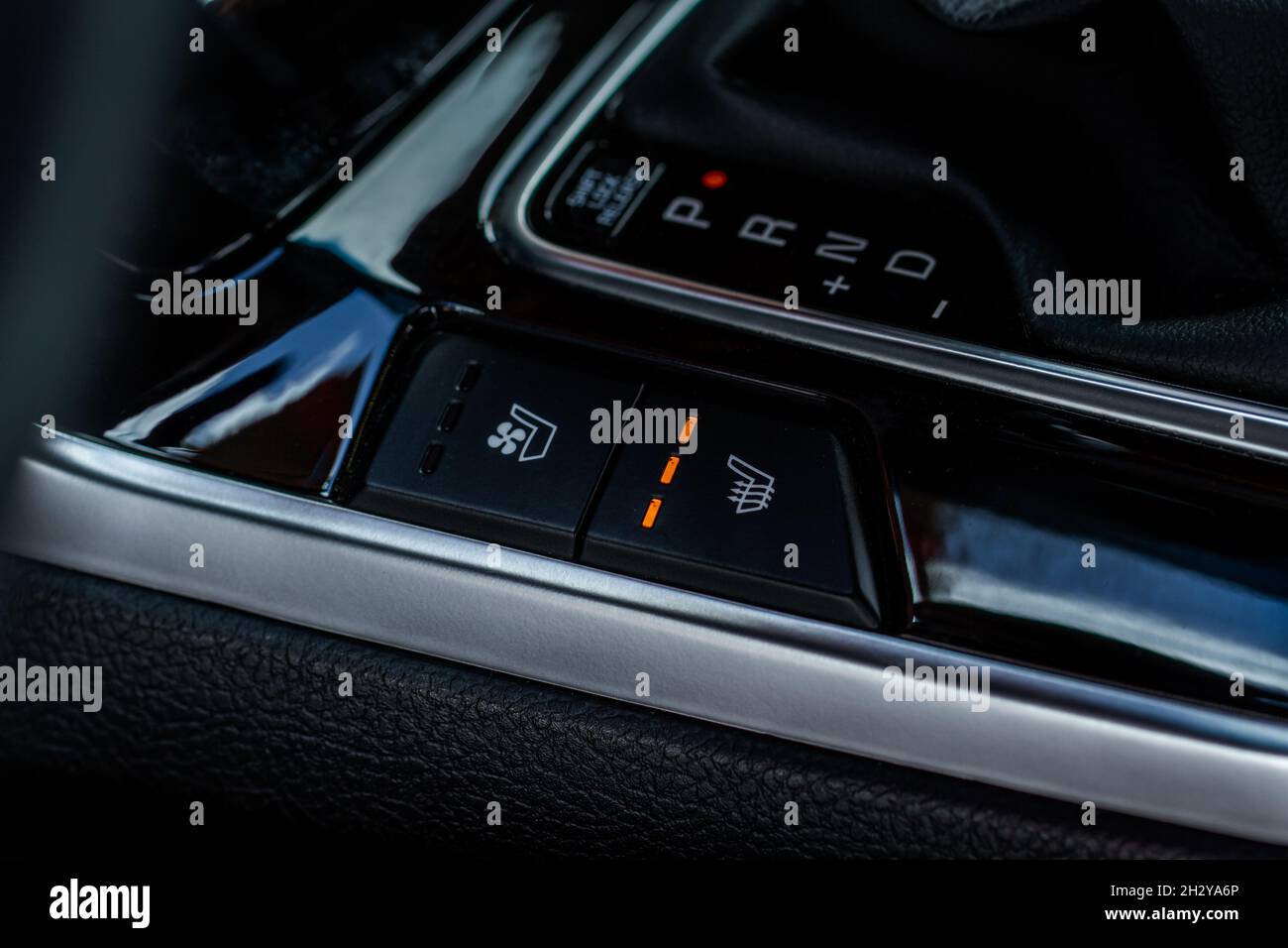 Seat heating controller buttons close up view. Car interior. Seat ...