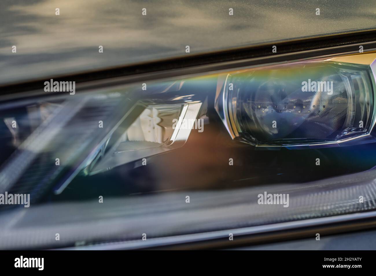 Headlight lamp of new cars. Close up detail on one of the LED ...
