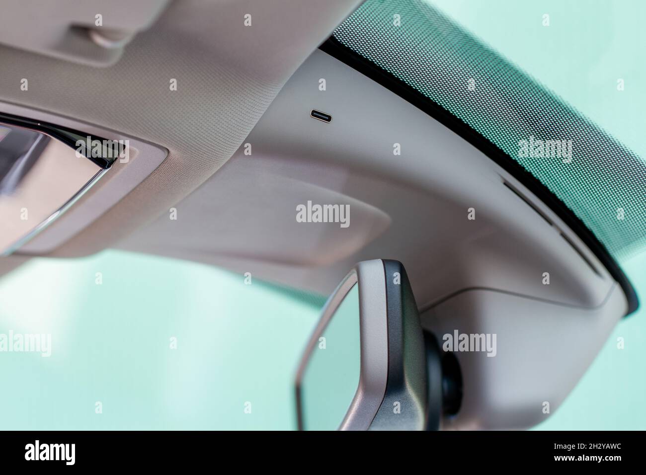 Opened car USB port in the car for connecting device. Power output of ...