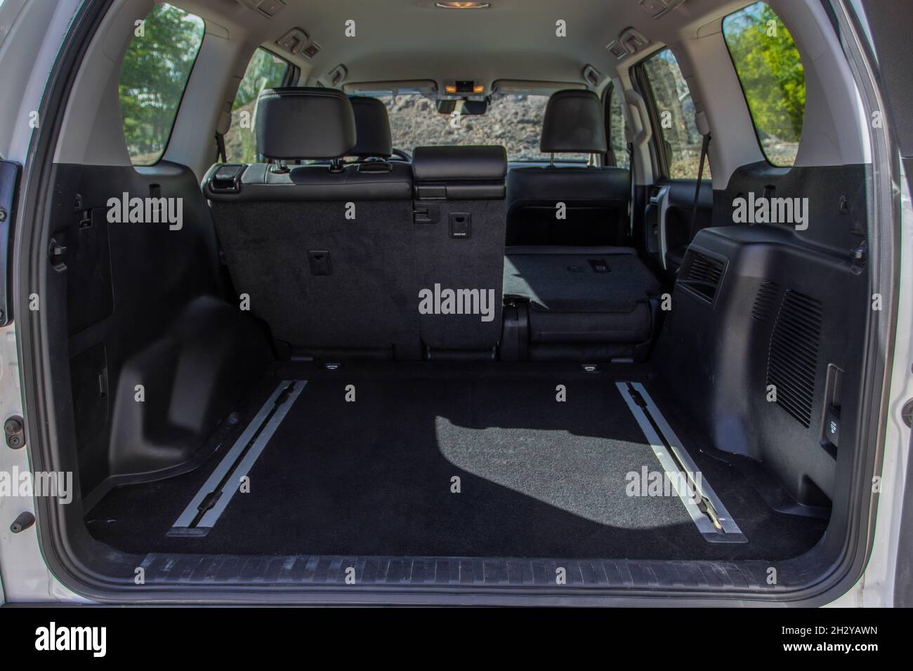 Huge, clean and empty car trunk in interior of compact suv. Rear view ...