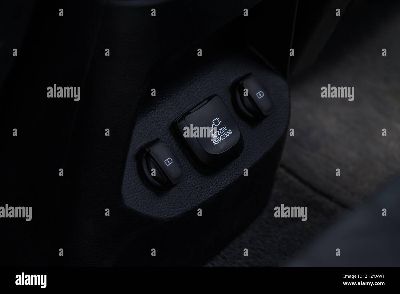 12V and 220v power outlet socket in the car. Closed sockets Stock Photo ...