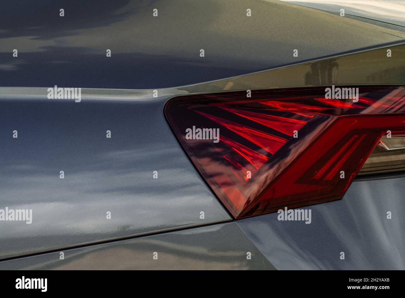 Modern rear light of a car. Brake light and arrow of large suv. Rear ...