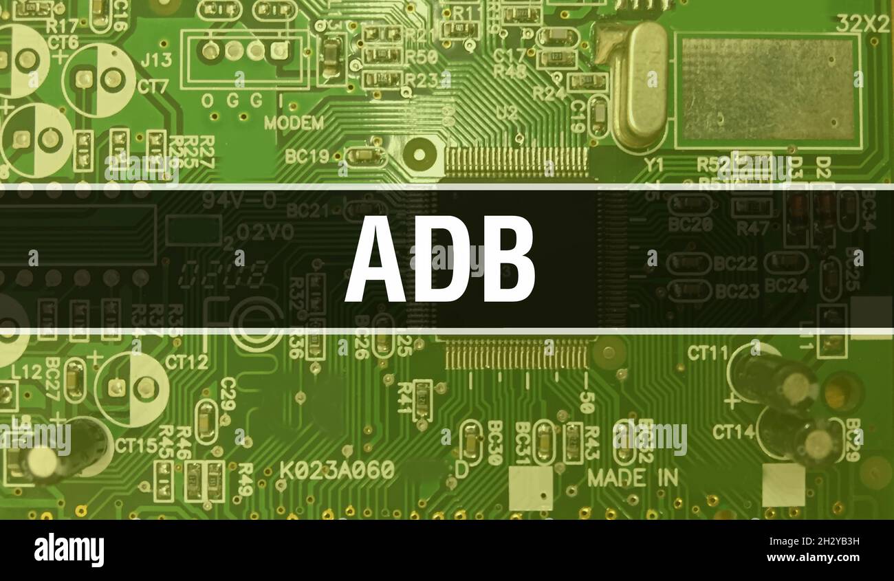 ADB concept with Computer motherboard. ADB text written on Technology ...