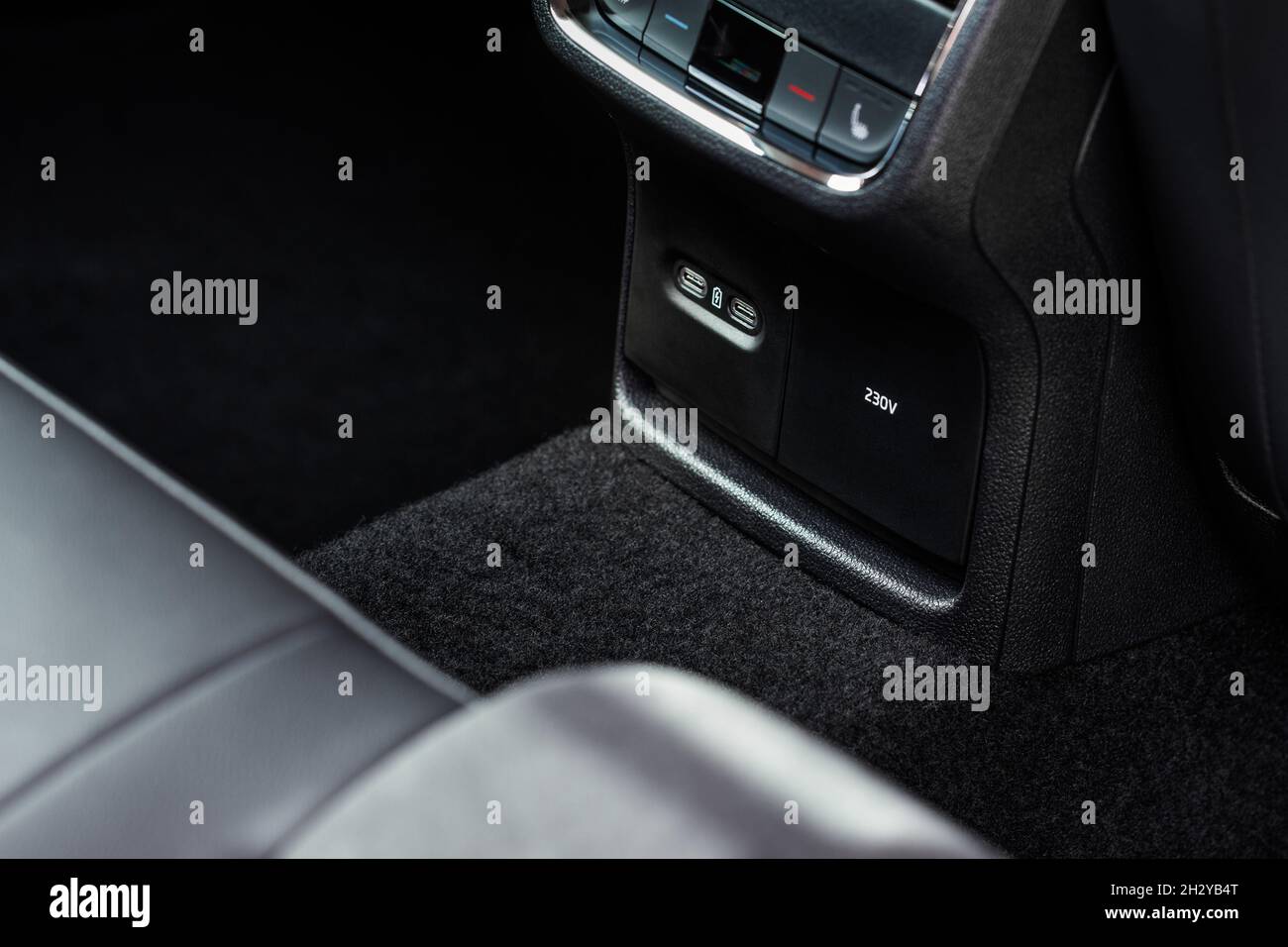 12V and 220v power outlet socket in the car. Closed sockets Stock Photo ...