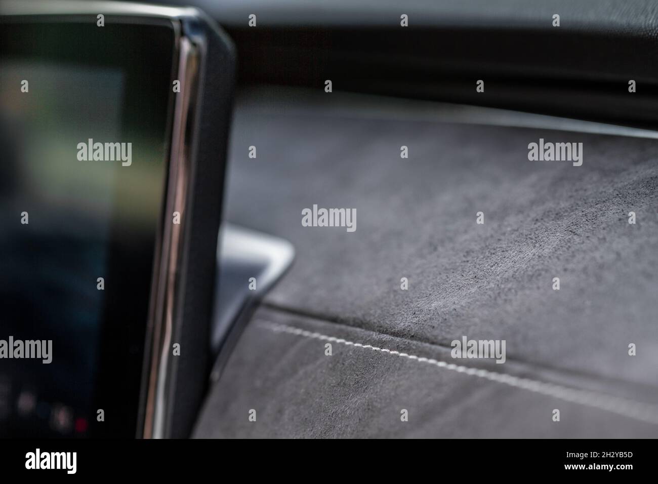 Modern car interior close up view with metallic and plastic details ...