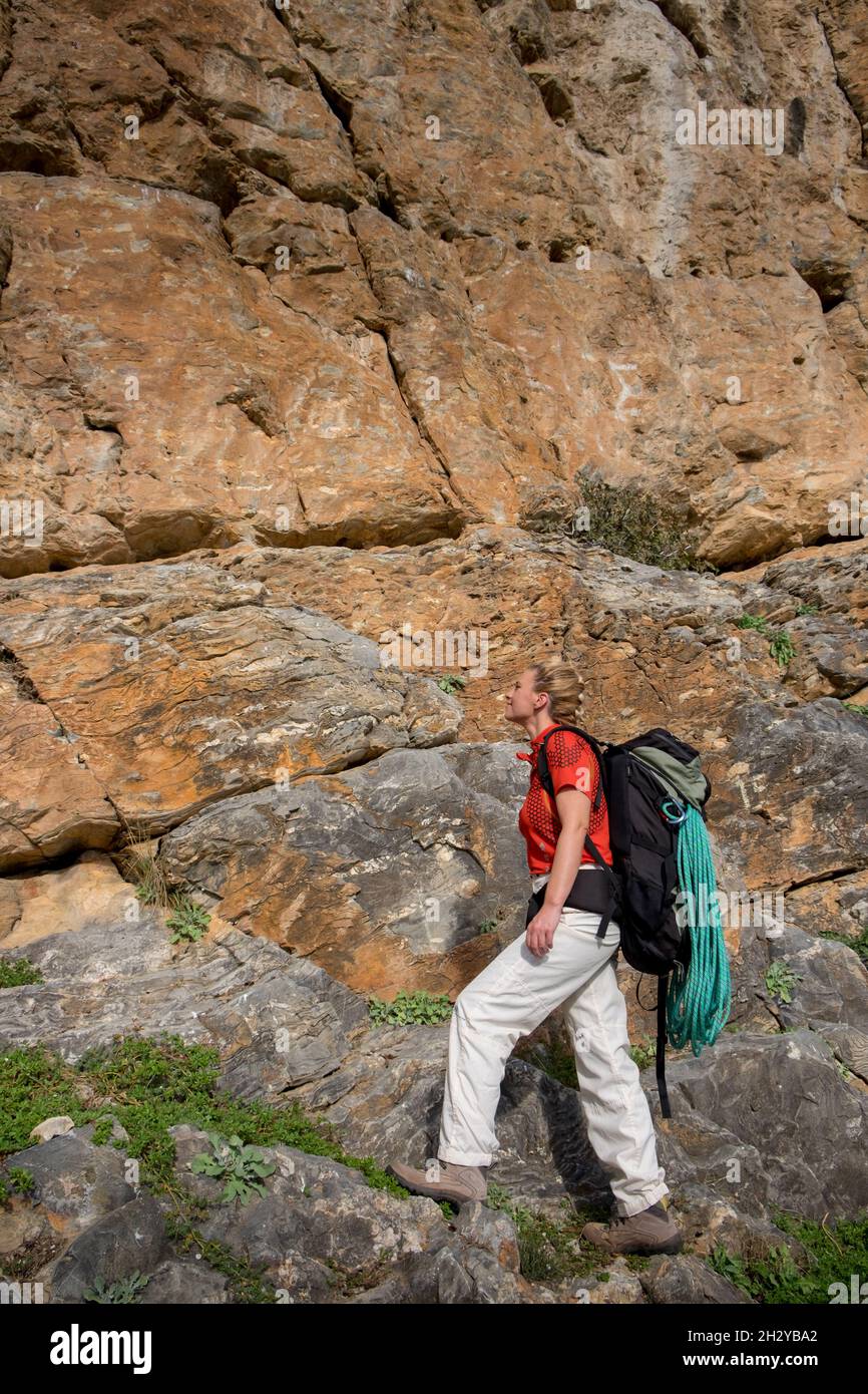 Female rock climber with climbing equipment Stock Photo - Alamy