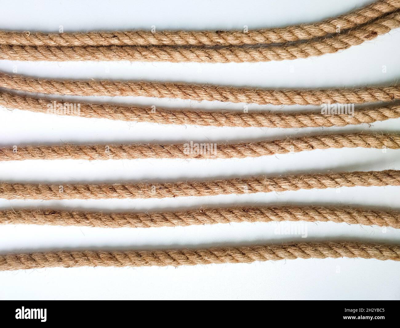Jute rope strings background isolated on white background Stock Photo ...
