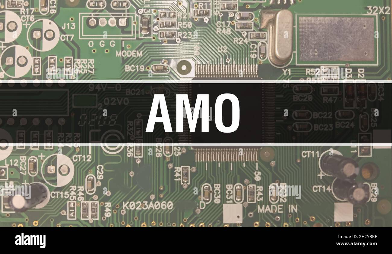 AMO concept with Computer motherboard. AMO text written on Technology ...