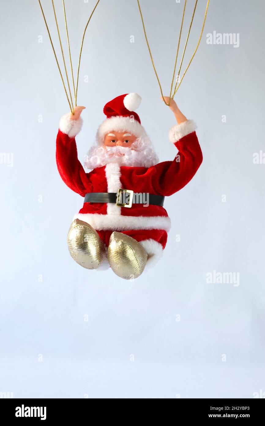 Parachuting santa claus hi-res stock photography and images - Alamy