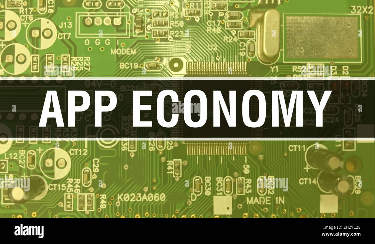 App Economy concept with Computer motherboard. App Economy text written ...