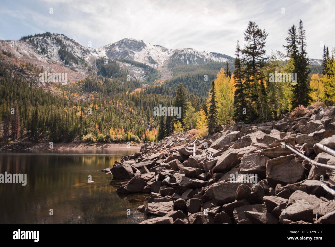 A lake surrounded by fall foliage at Independence Pass near Aspen ...