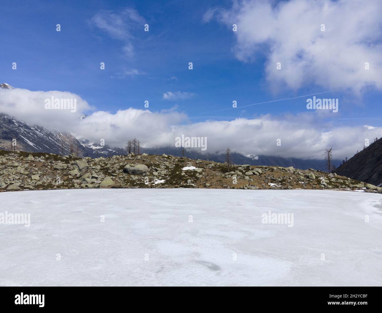 The snowy slope of a mountain for hikers Stock Photo - Alamy