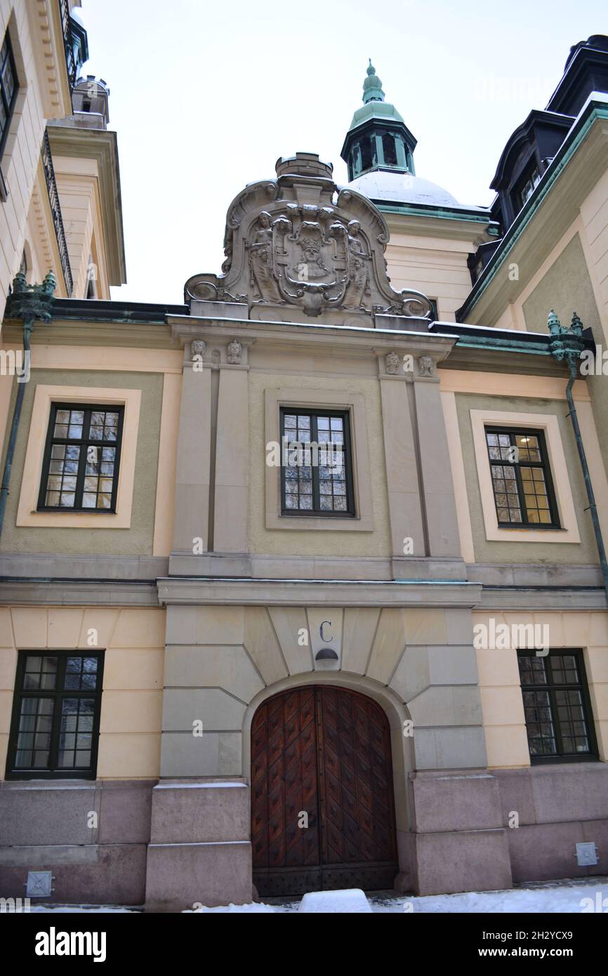 A vertical low angle shot of beautiful architecture with modern windows ...