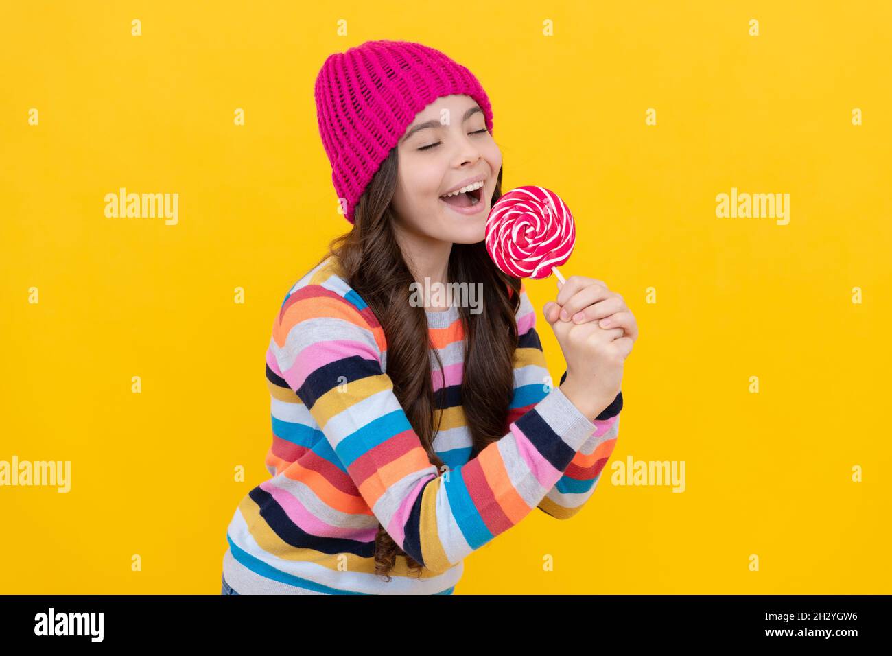 yummy. happy teen girl singer hold lollipop. lollipop lady. hipster kid ...