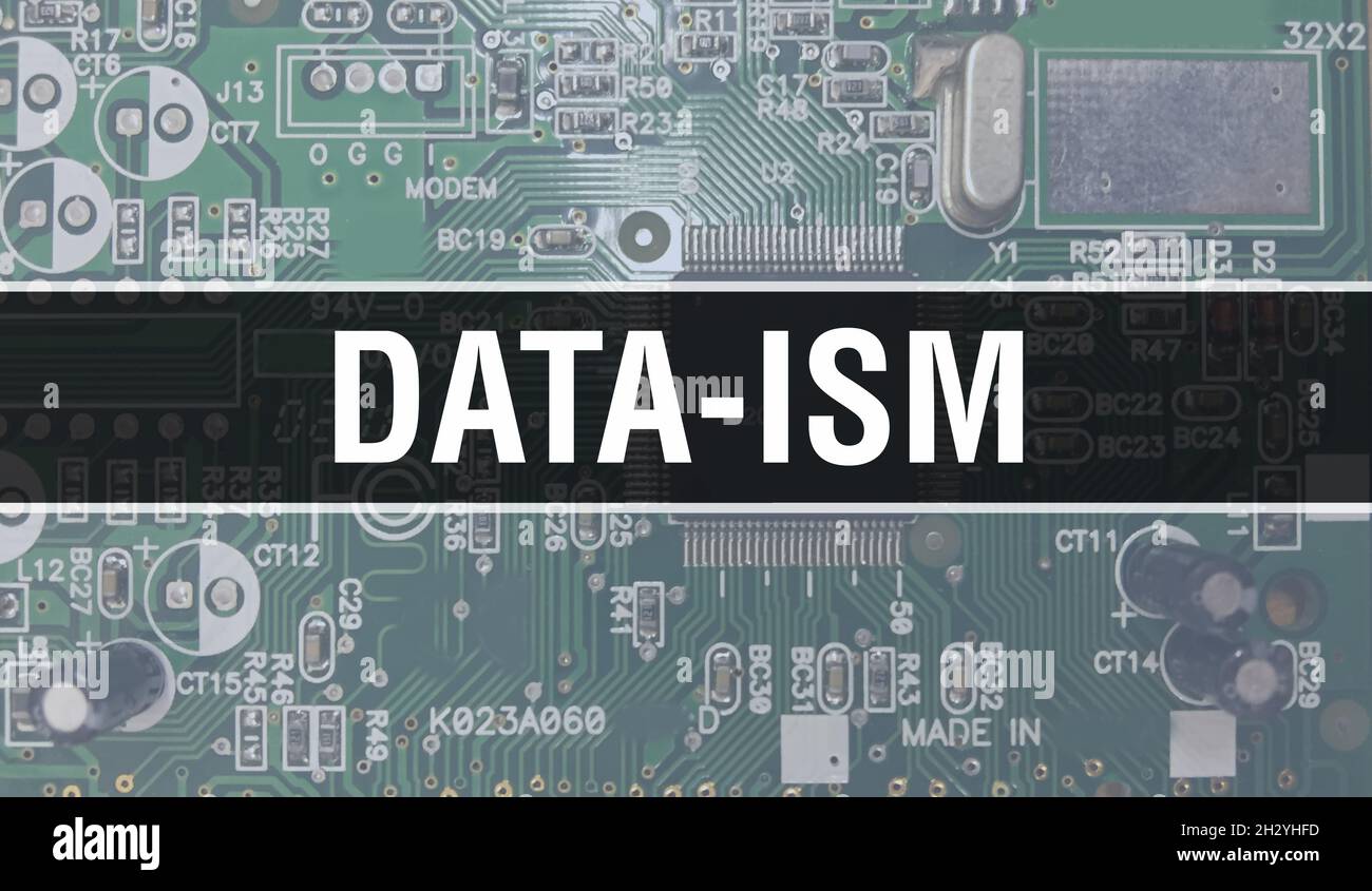 Data-ism concept with Computer motherboard. Data-ism text written on ...