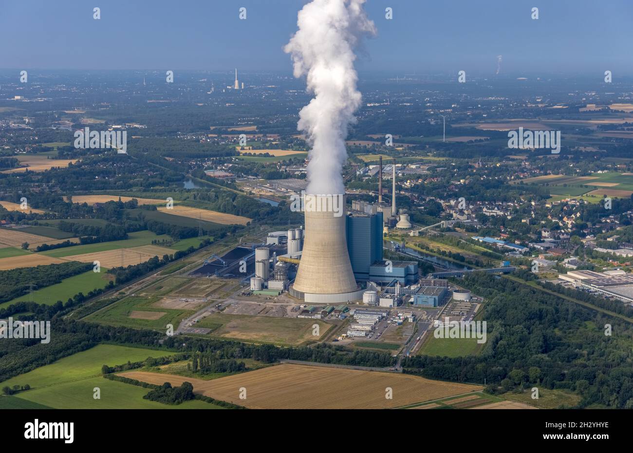 Aerial view of the power plant facilities and exhaust towers of the ...