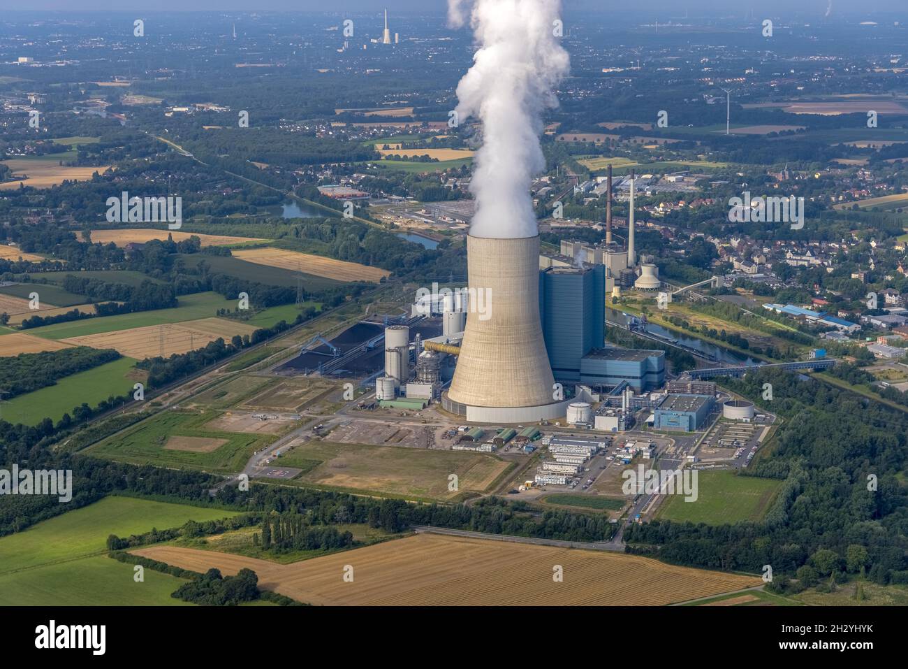 Aerial view of the power plant facilities and exhaust towers of the ...
