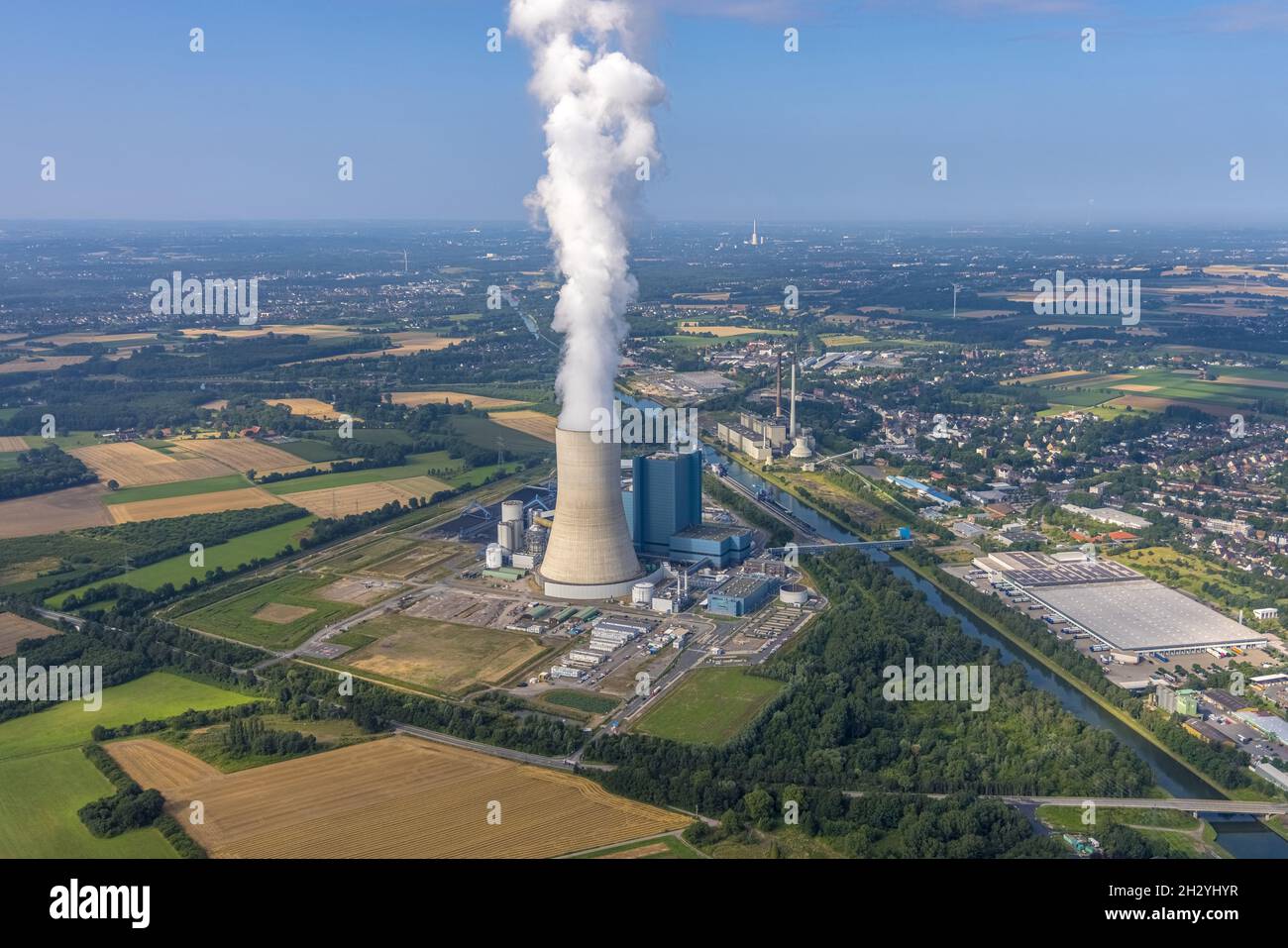 Aerial view of the power plant facilities and exhaust towers of the ...