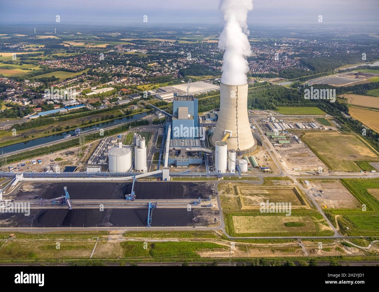 Aerial view of the power plant facilities and exhaust towers of the ...