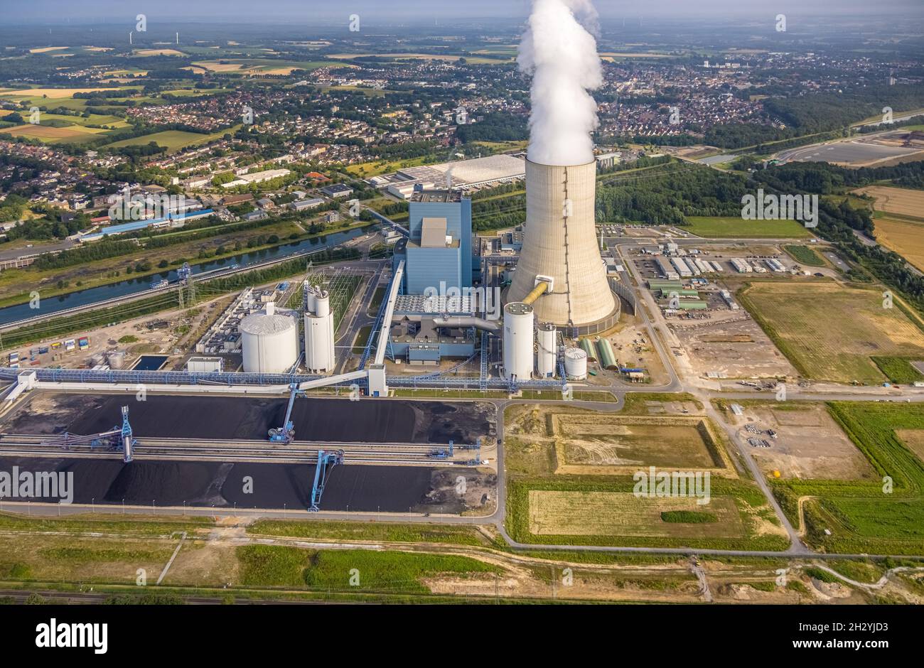 Aerial view of the power plant facilities and exhaust towers of the ...