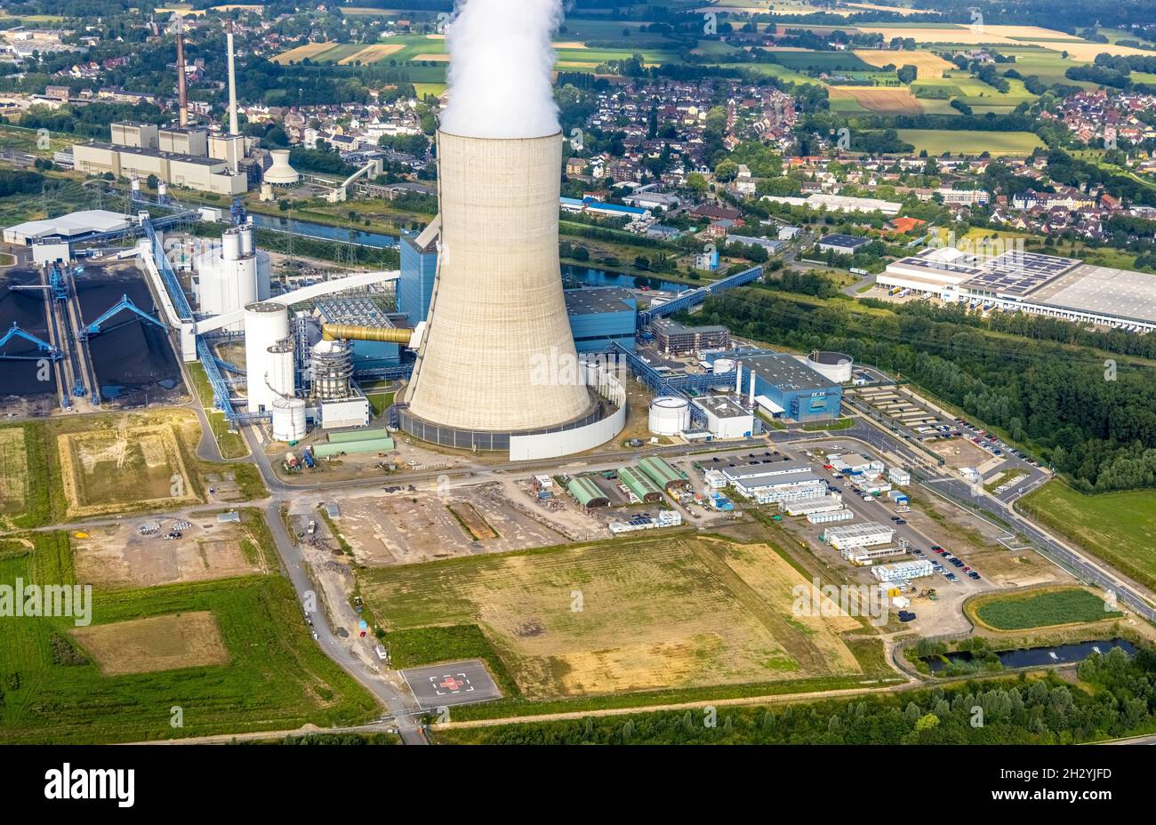 Aerial view of the power plant facilities and exhaust towers of the ...