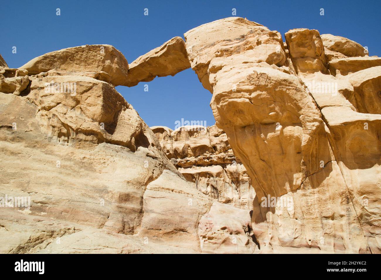 Magnificient rock arches of Wadi Rum desert, Jordan Stock Photo - Alamy