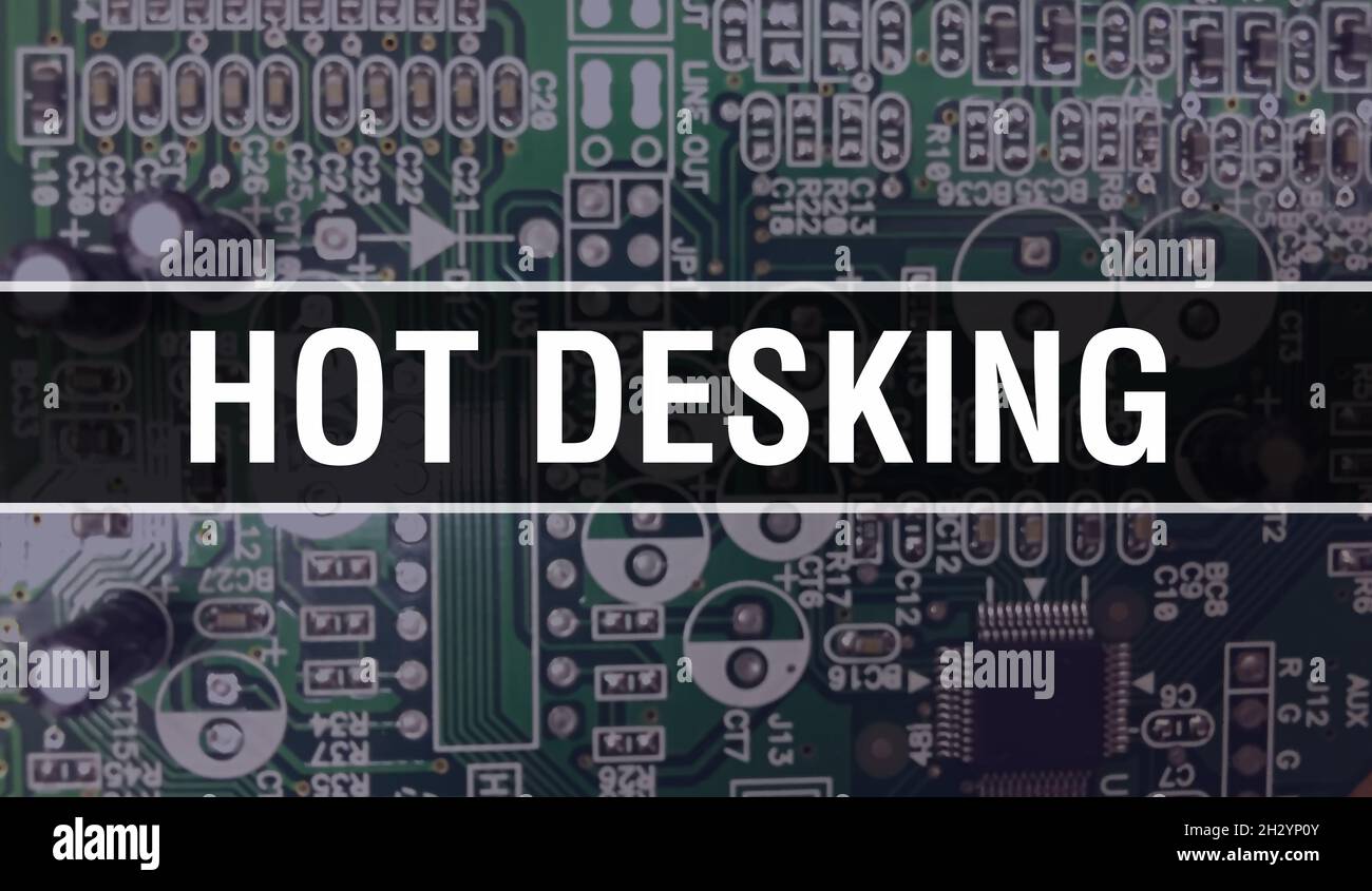 Hot Desking concept with Computer motherboard. Hot Desking text written ...