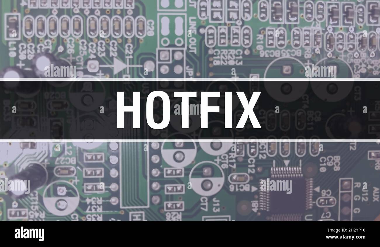 Hotfix concept with Computer motherboard. Hotfix text written on ...