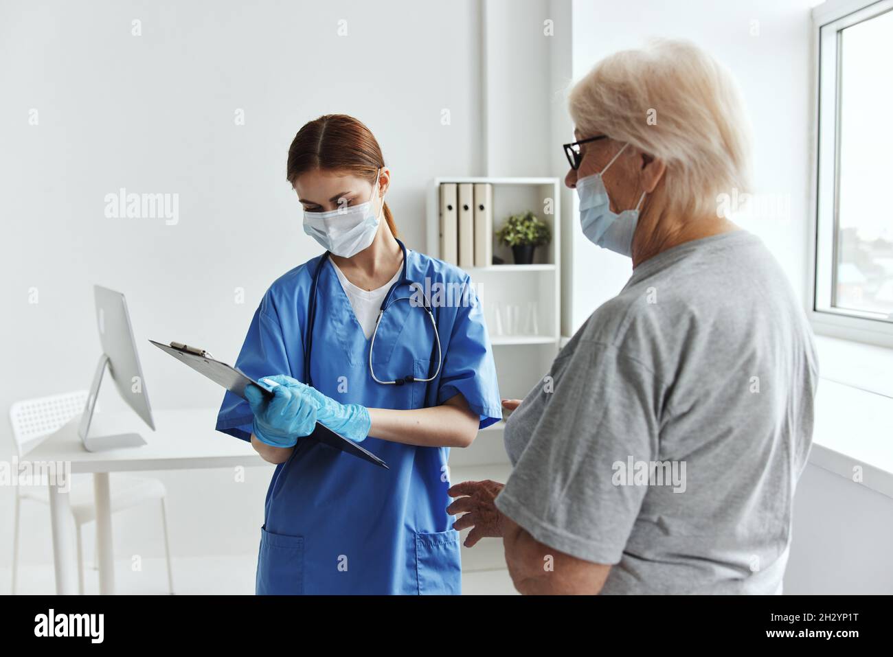 patient and doctor Hospital visit health care Stock Photo - Alamy