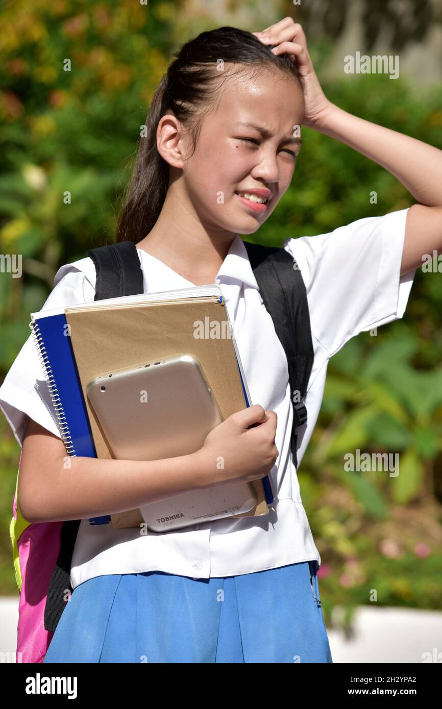 A Worried Youthful Filipina Female Student Stock Photo - Alamy