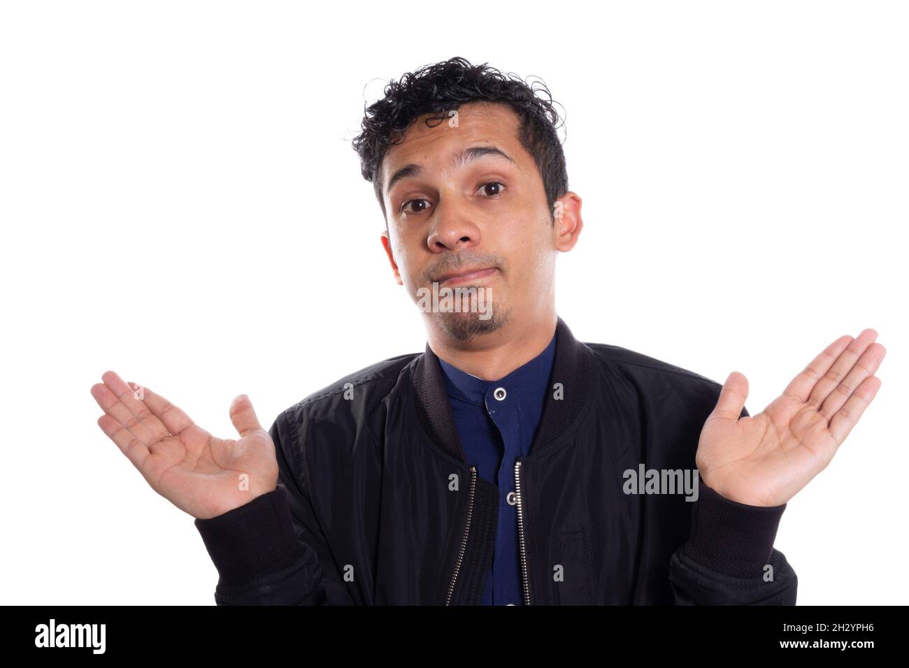 Misunderstood man raising hands and shoulders. White background ...
