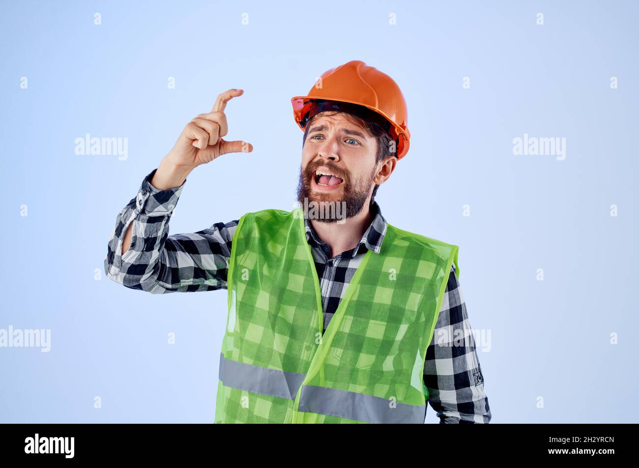 bearded man in orange hard hat construction professional blue ...