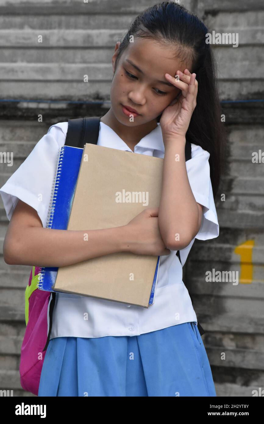 Youthful Asian Female Student And Sadness Stock Photo - Alamy