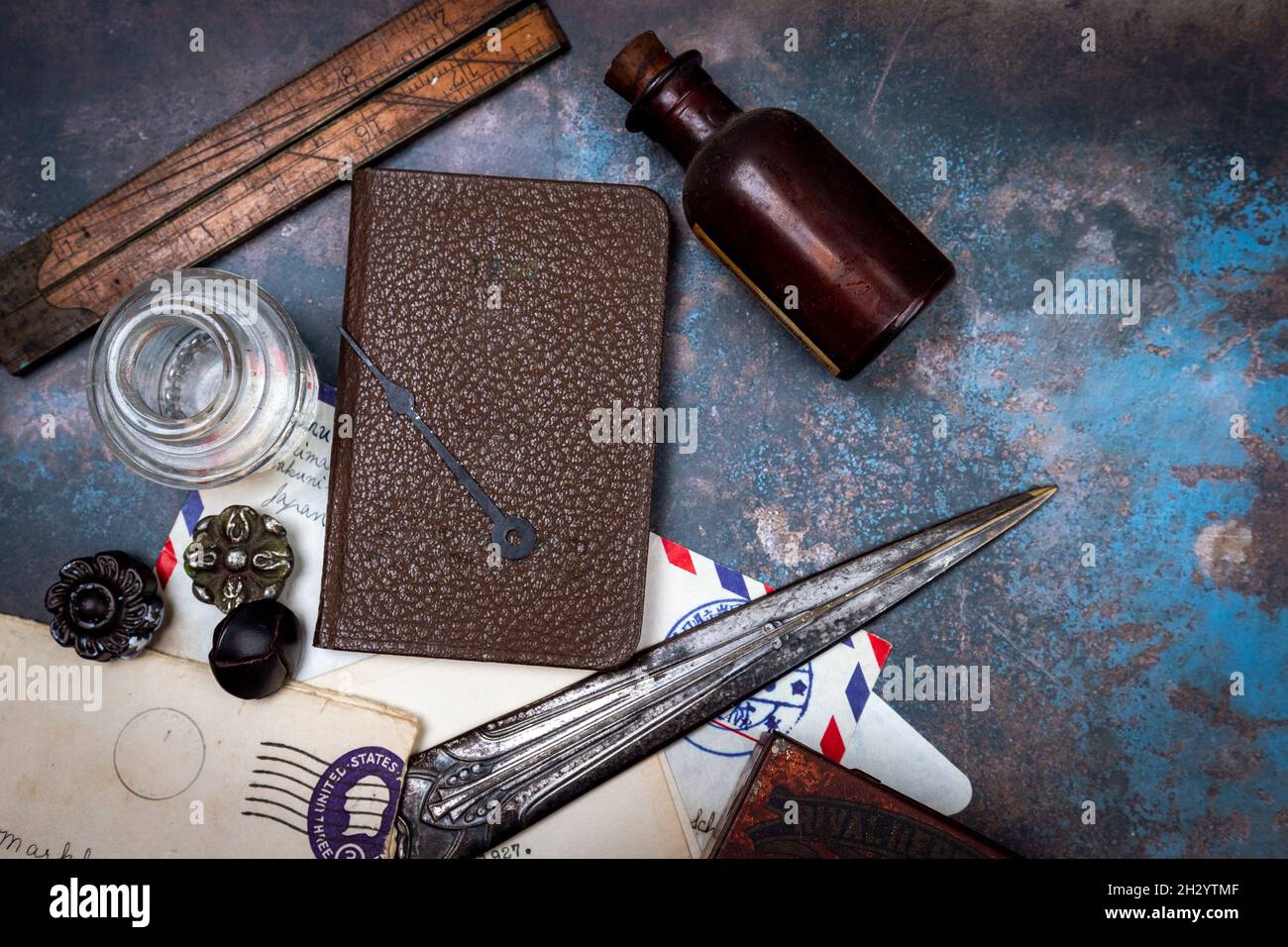 Vintage office supplies, glass bottle and mail lay flat Stock Photo - Alamy