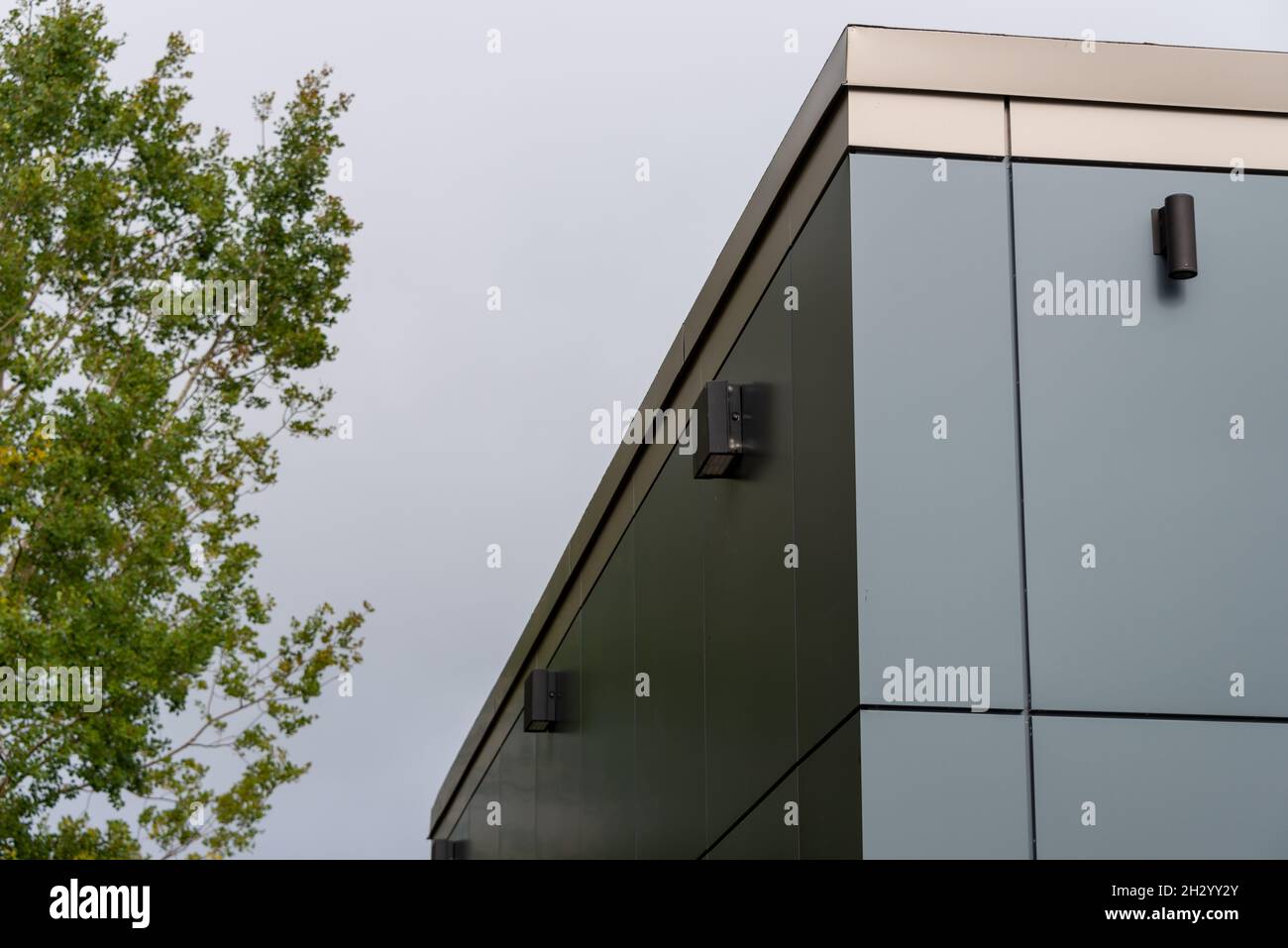 The exterior wall of a contemporary commercial style building with ...